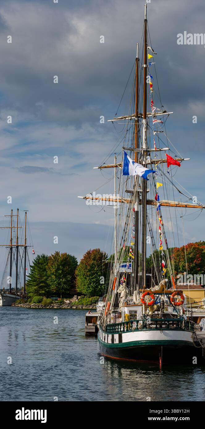 Vertical frame of two tall ships moored at port on the St. Lawrence ...