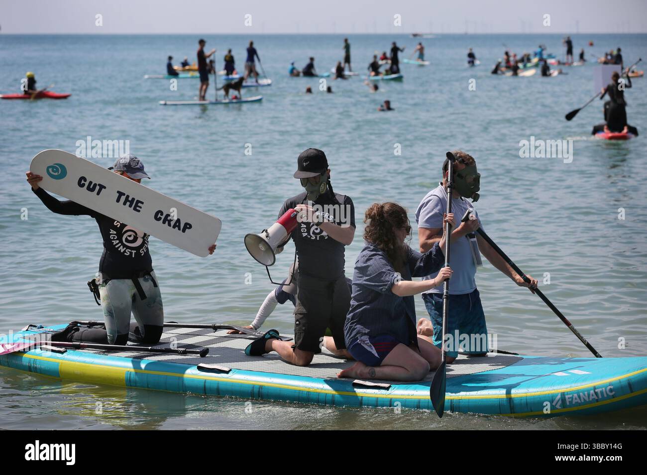 May 17, 2025, Brighton, England, UK: Protesters with signs and a gas ...