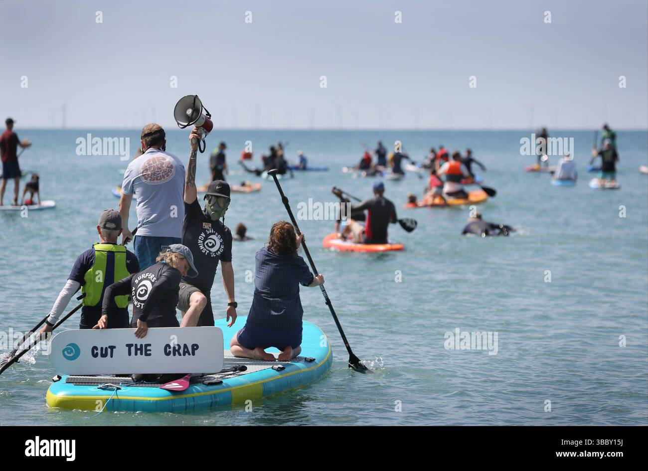 May 17, 2025, Brighton, England, UK: Protesters with signs and a gas ...