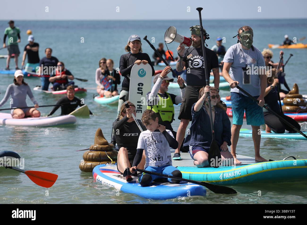 May 17, 2025, Brighton, England, UK: Protesters with signs and a gas ...