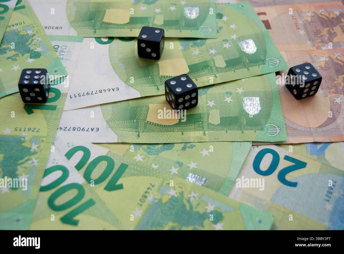 Dice and money. euro notes with cubic dice. Risk and money concept ...