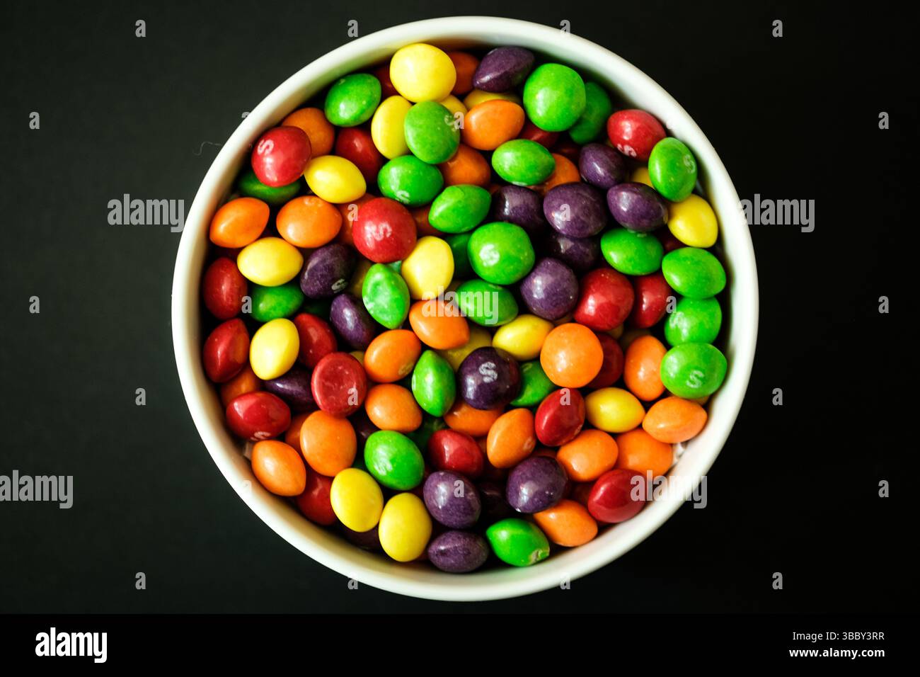 London UK, May 17 2025, Bowl of Fruit Flavoured Skittles Sweets Stock ...