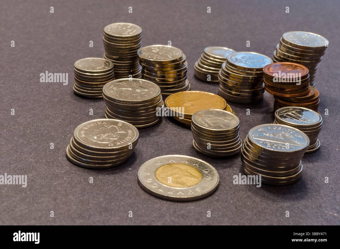 Multiple stacks of Canadian coins Stock Photo - Alamy