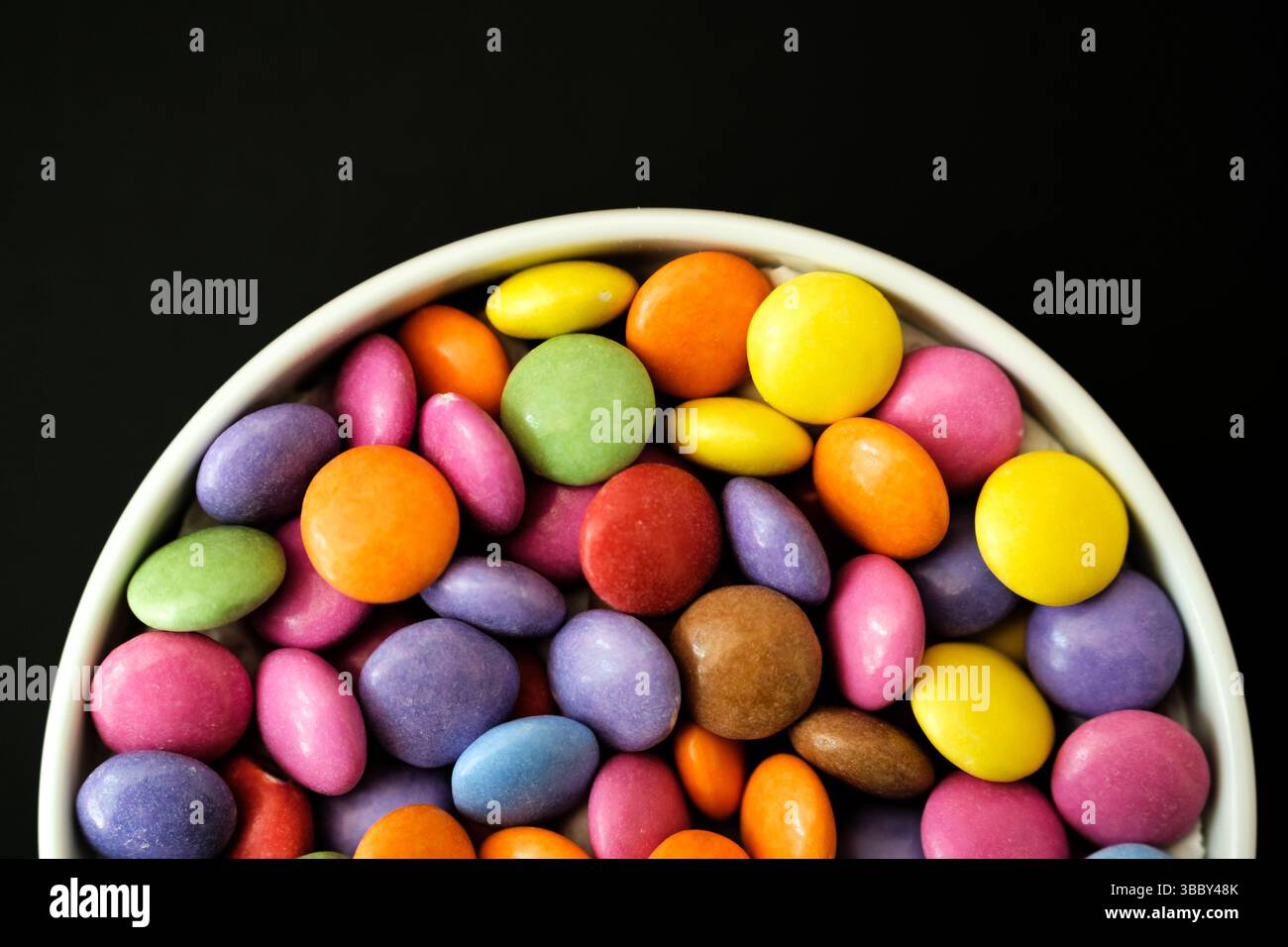 London UK, May 17 2025, A Bowl of Classic Nestle Smarties Sugar Coated ...