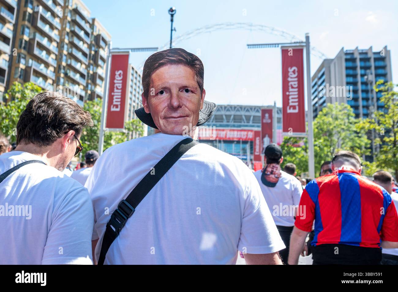 London, UK. 17 May 2025. A Crystal Palace fan wears an Oliver Glasner ...