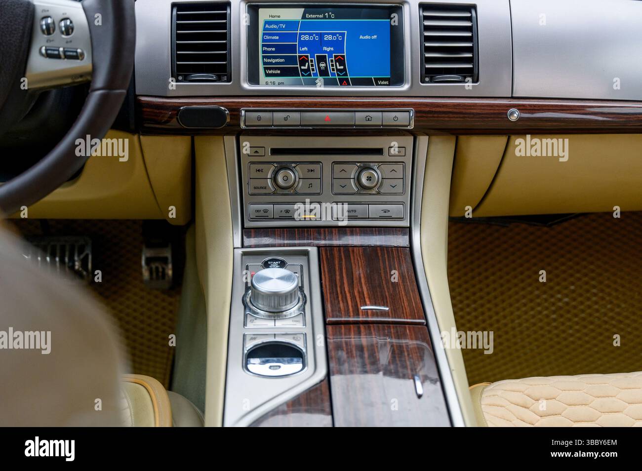 Black leather steering wheel, automatic transmission and modern control ...