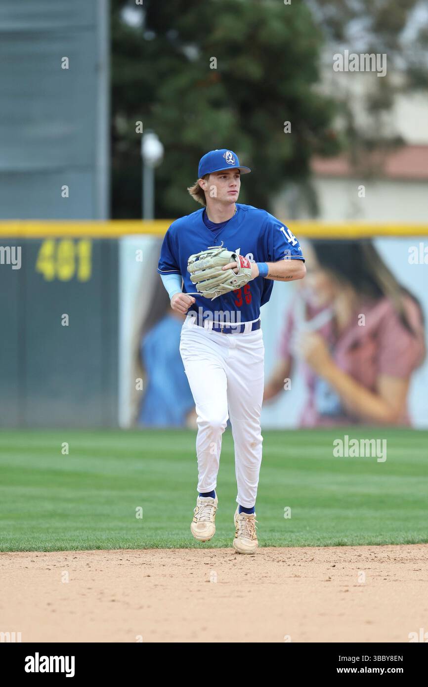 Mike Sirota (36) of the Rancho Cucamonga Quakes returns to the dugout ...