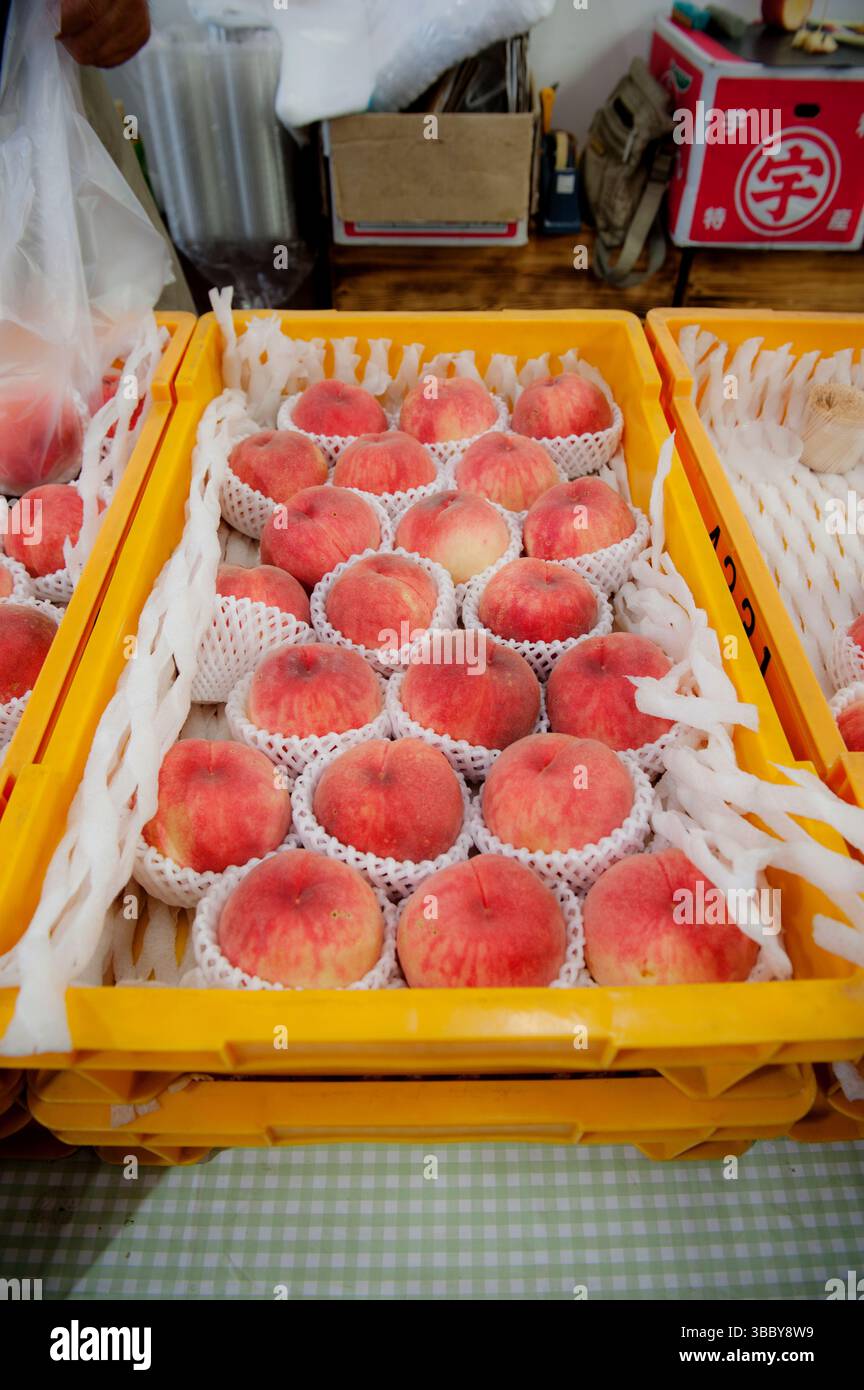 Beautiful display of peaches, Japan Stock Photo - Alamy