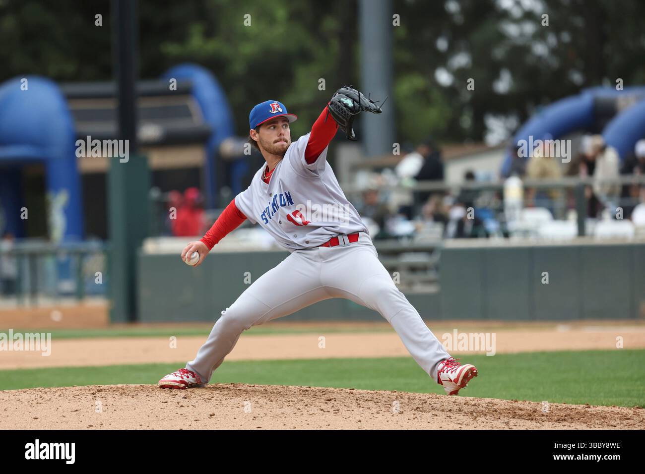 Blake Hammond (12) of the Stockton Ports pitches against the Rancho ...