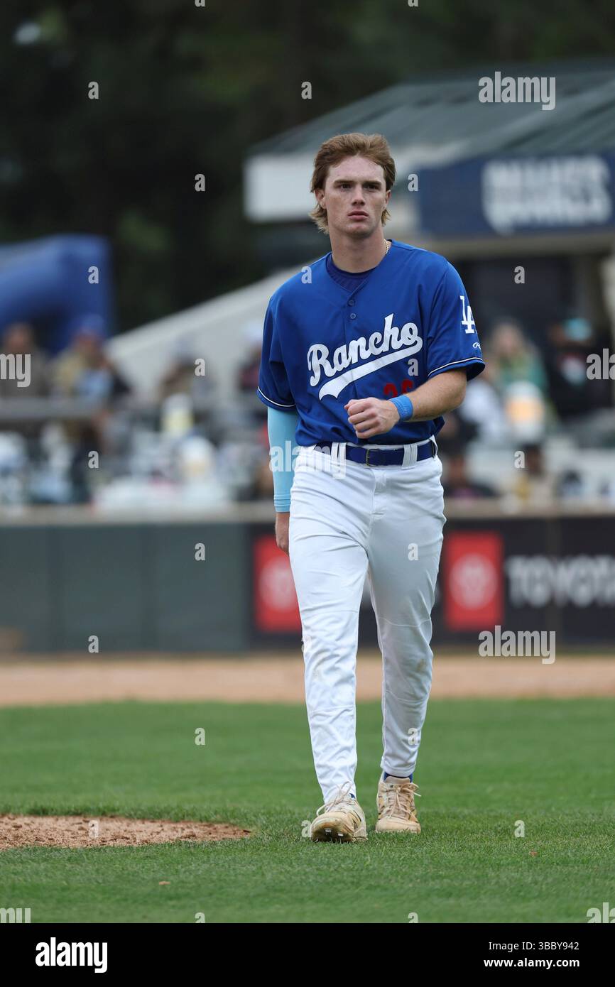 Mike Sirota (36) of the Rancho Cucamonga Quakes returns to the dugout ...