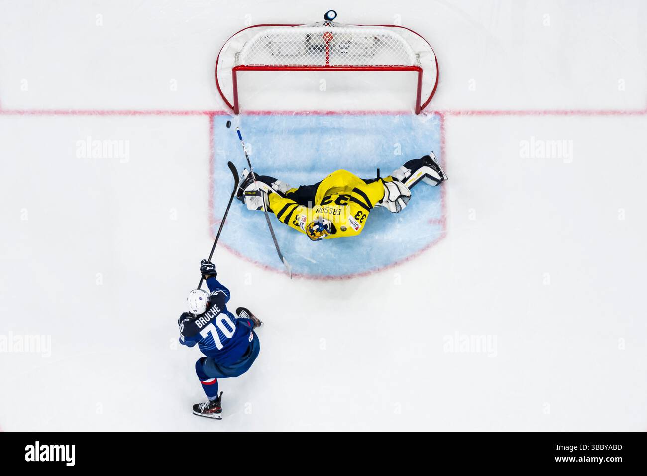 Goaltender Samuel Ersson of, Sweden. , . and goaltender Julian Junca of ...