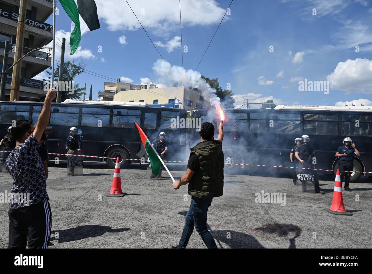 Commemoration of Nakba Day in Athens A man holds a flare and waves a ...