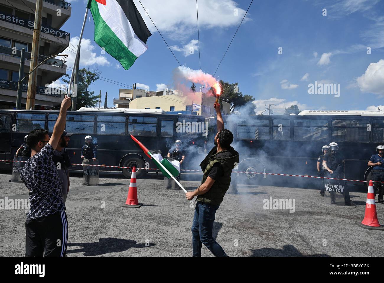 Commemoration of Nakba Day in Athens A man holds a flare and waves a ...