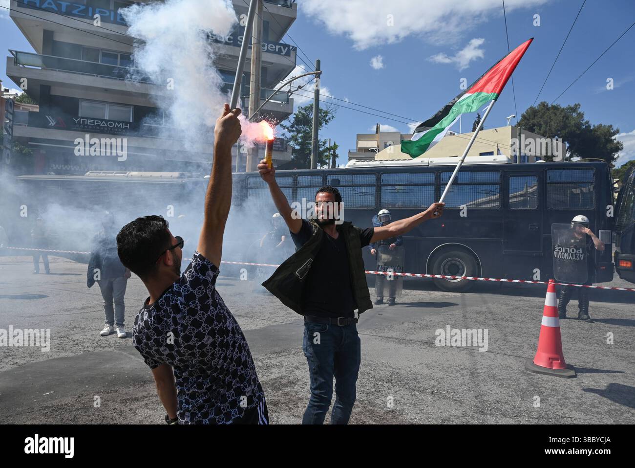 Commemoration of Nakba Day in Athens A man holds a flare and waves a ...