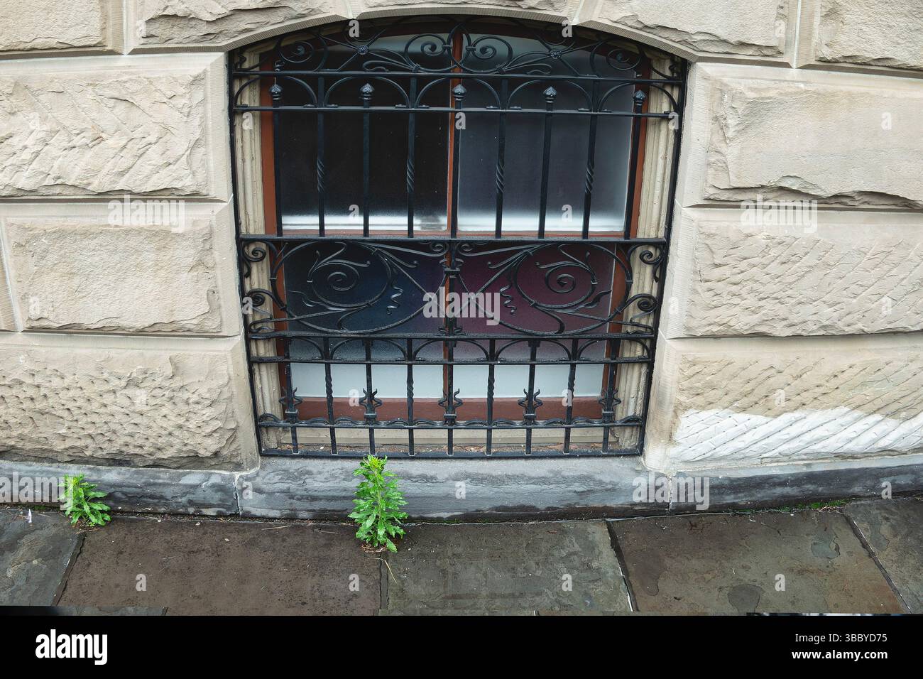 barred basement window in an old apartment building Stock Photo - Alamy
