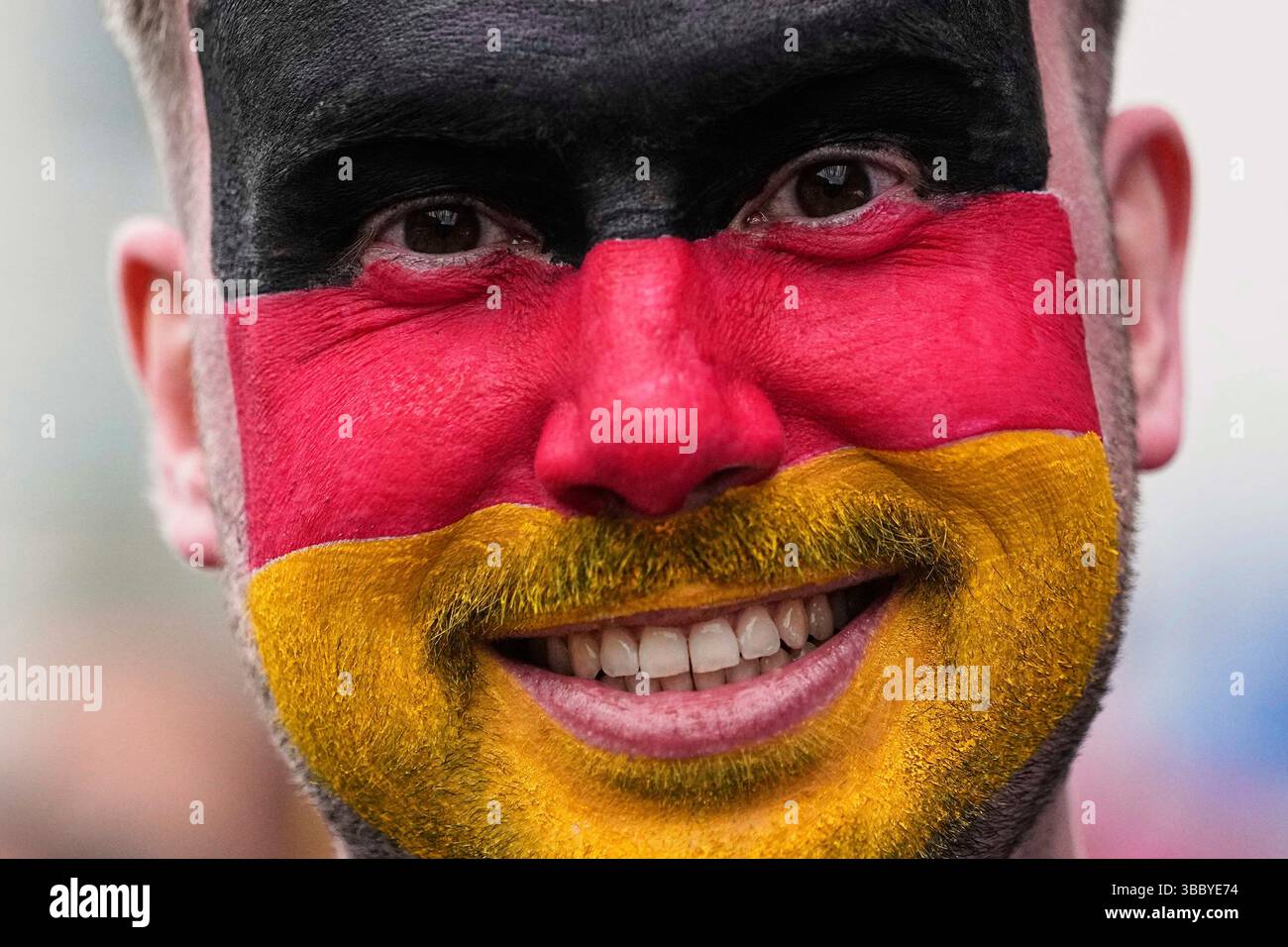 A German Eurovision fan is pictured in the cue to the Grand Final of ...