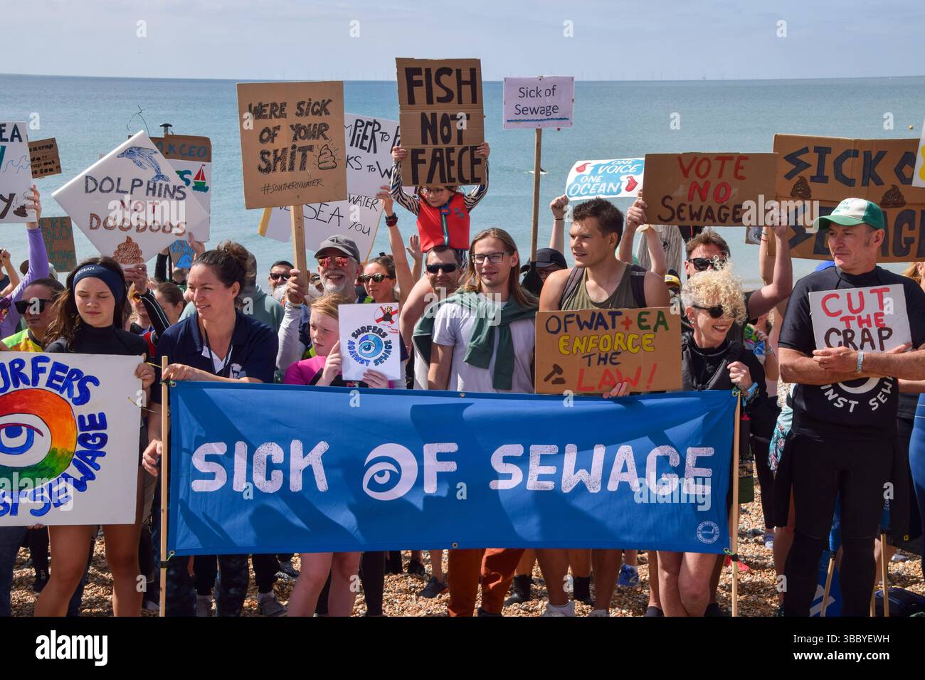 Brighton, UK. 17th May, 2025. Protesters holding a 'Sick of sewage ...