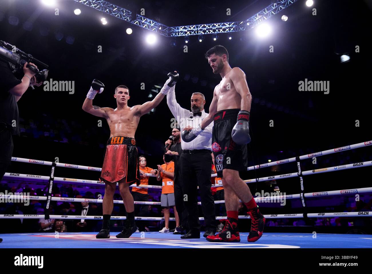 Emmanuel Buttigieg lifts his arms after beating Novak Radulovic in ...