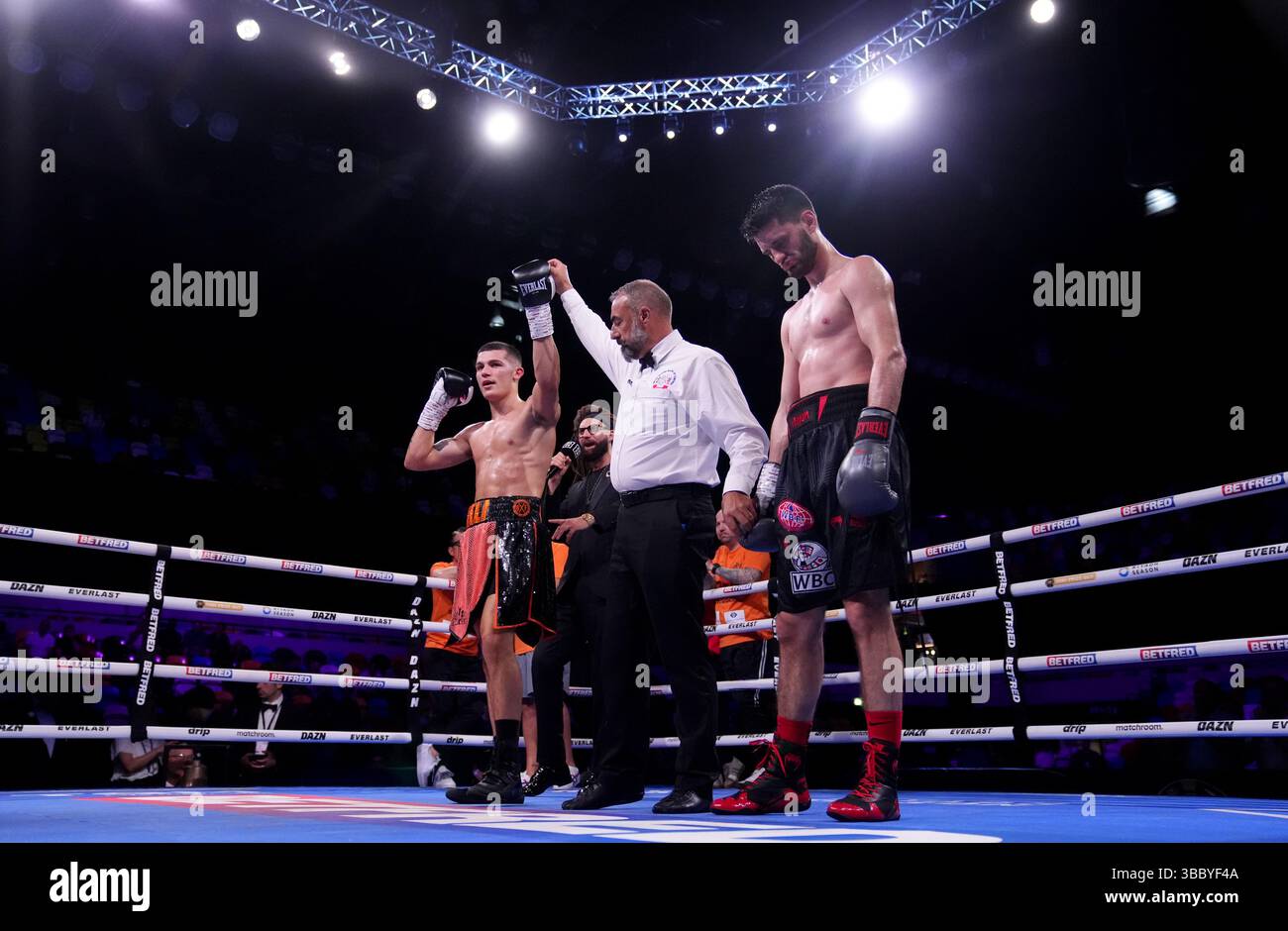 Emmanuel Buttigieg lifts his arms after beating Novak Radulovic in ...