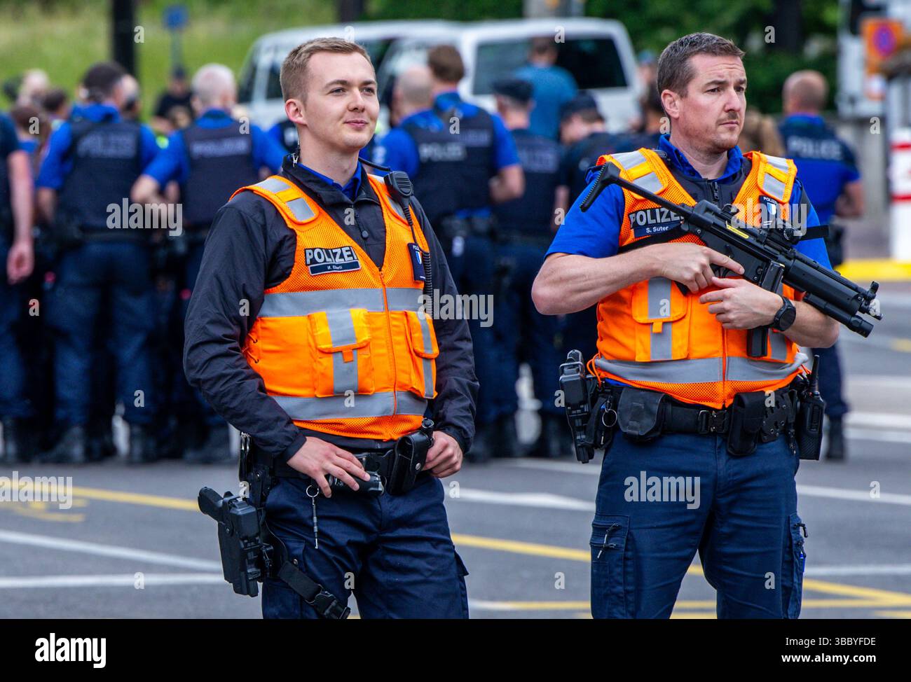Basel, Switzerland. 17th May, 2025. Police officers stand in front of ...