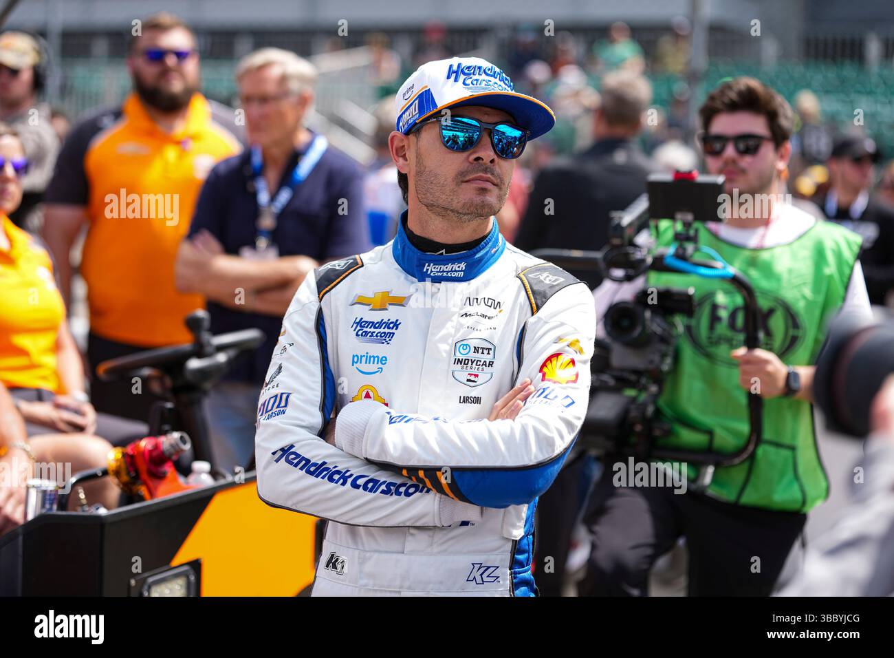 Kyle Larson watches as he waits for is turn during qualification for ...