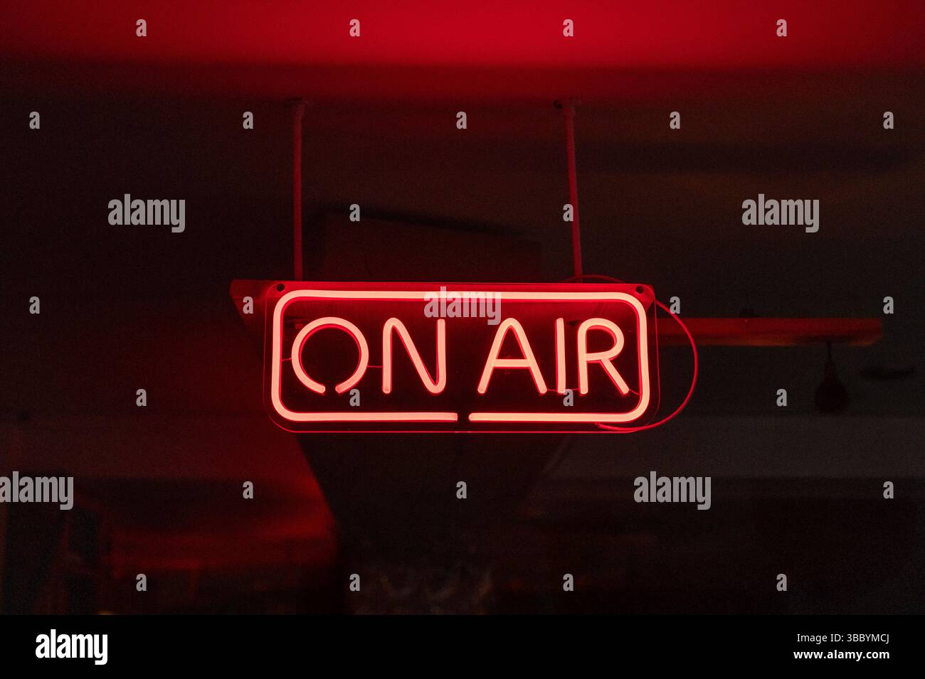 Red neon 'On Air' sign Stock Photo - Alamy