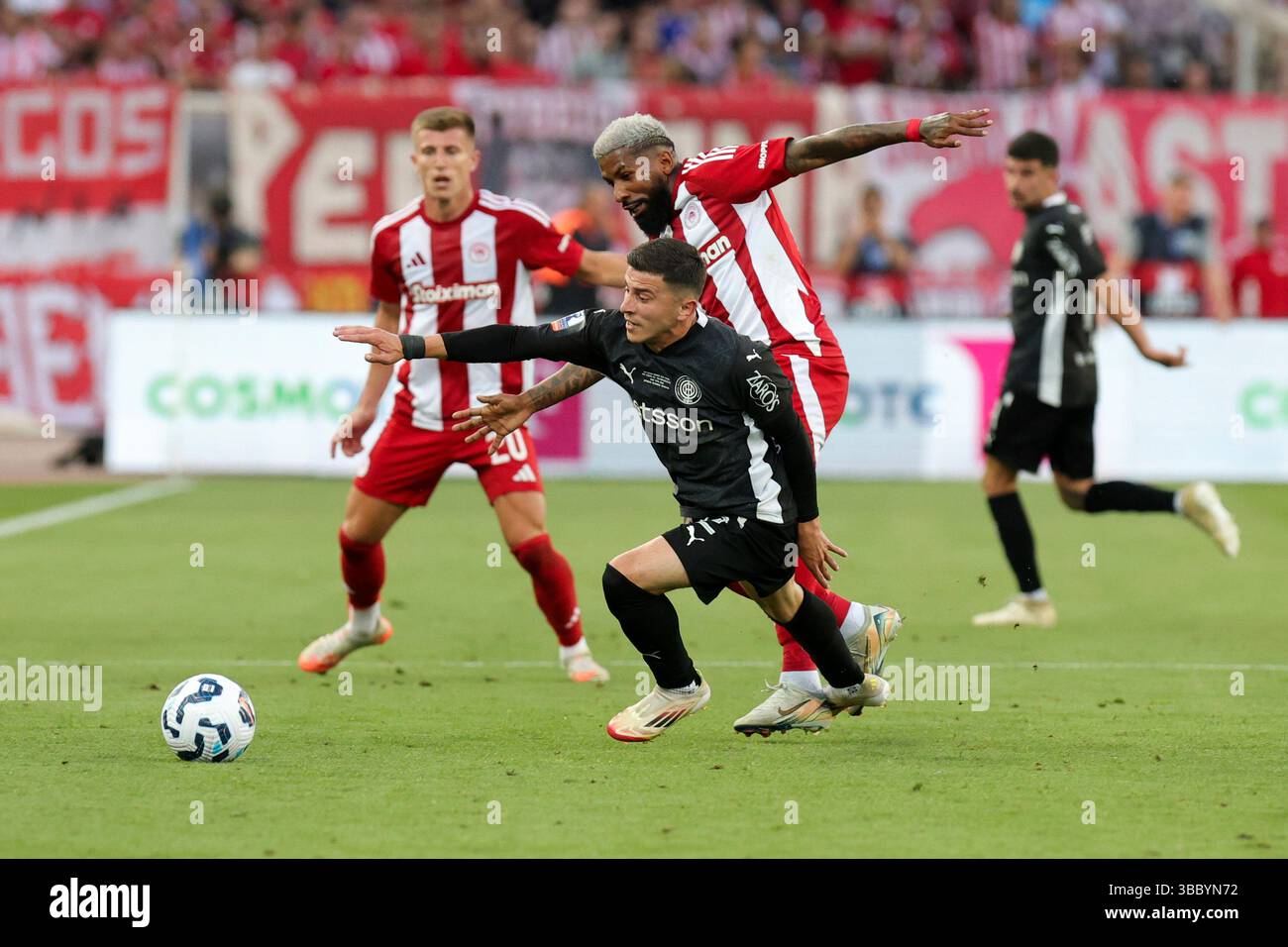 OFI's Elias Hatzitheodorides, front, struggles for the control of the ...