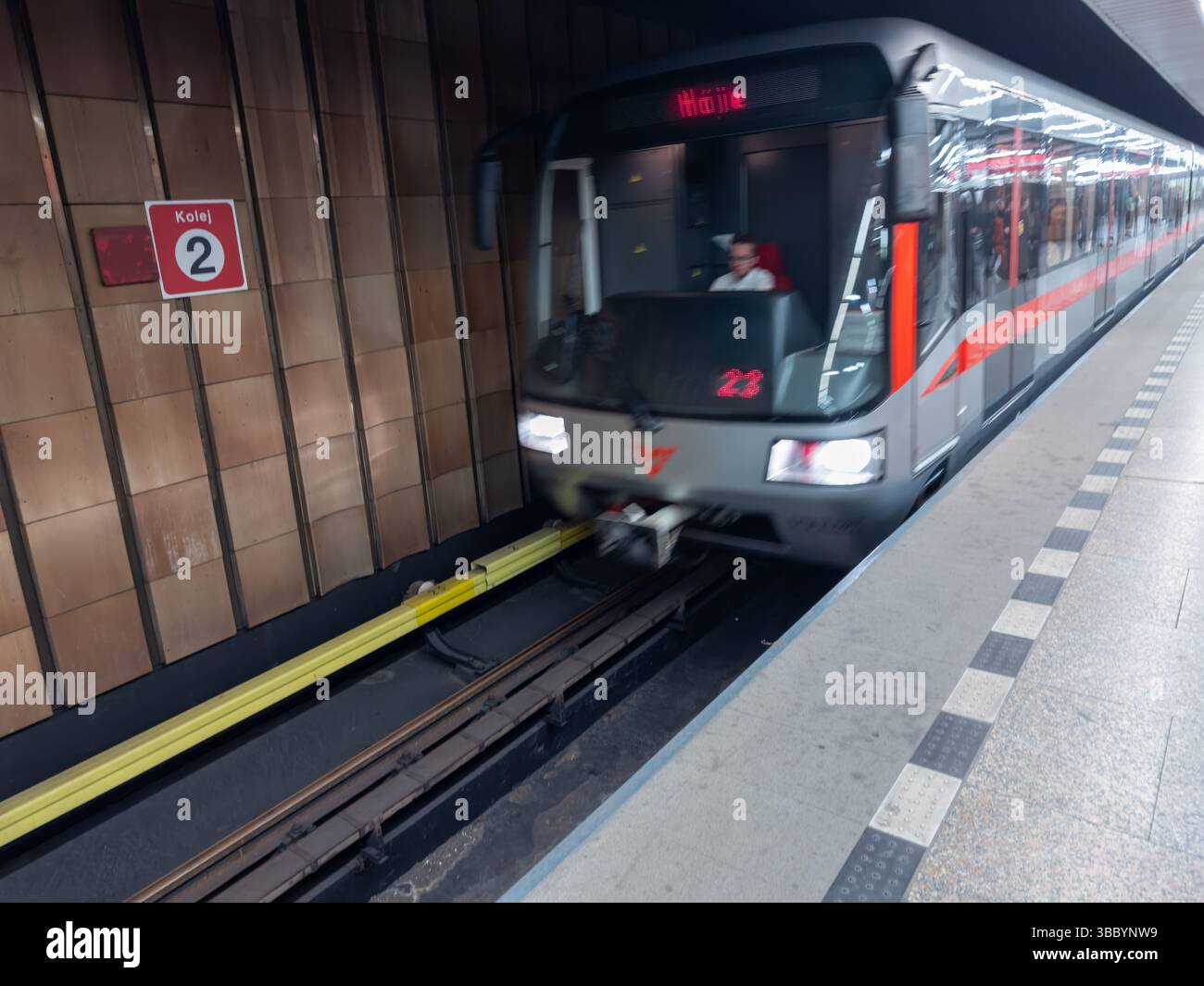 Subway train arriving at platform in Prague underground station Stock ...