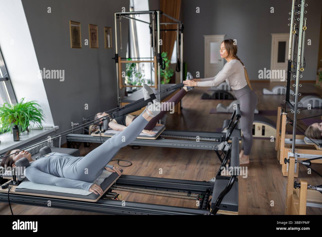 A detailed closeup of a foot work and core exercise on a Balanced Body ...