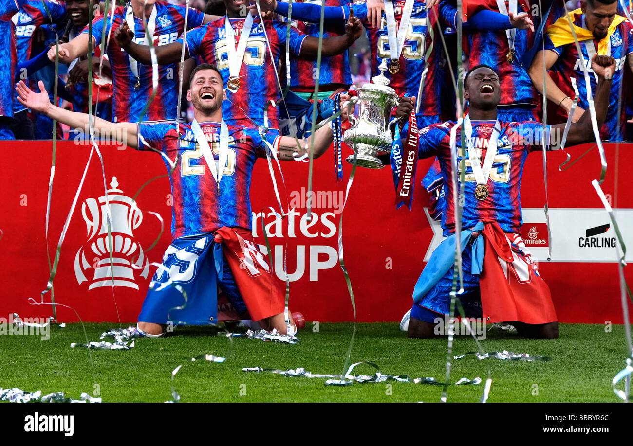 Crystal Palace's Joel Ward and Mark Guehi celebrate with the trophy ...