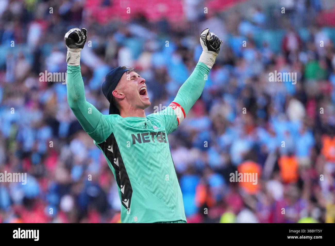 Crystal Palace goalkeeper Dean Henderson celebrates after the English ...