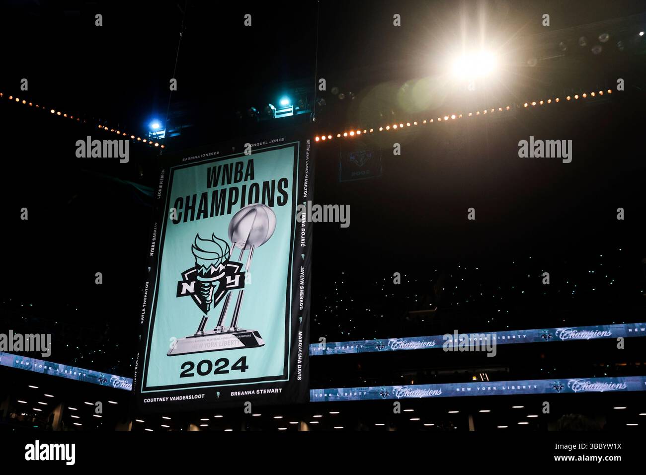 The New York Liberty 2024 WNBA Champions banner is raised before the ...