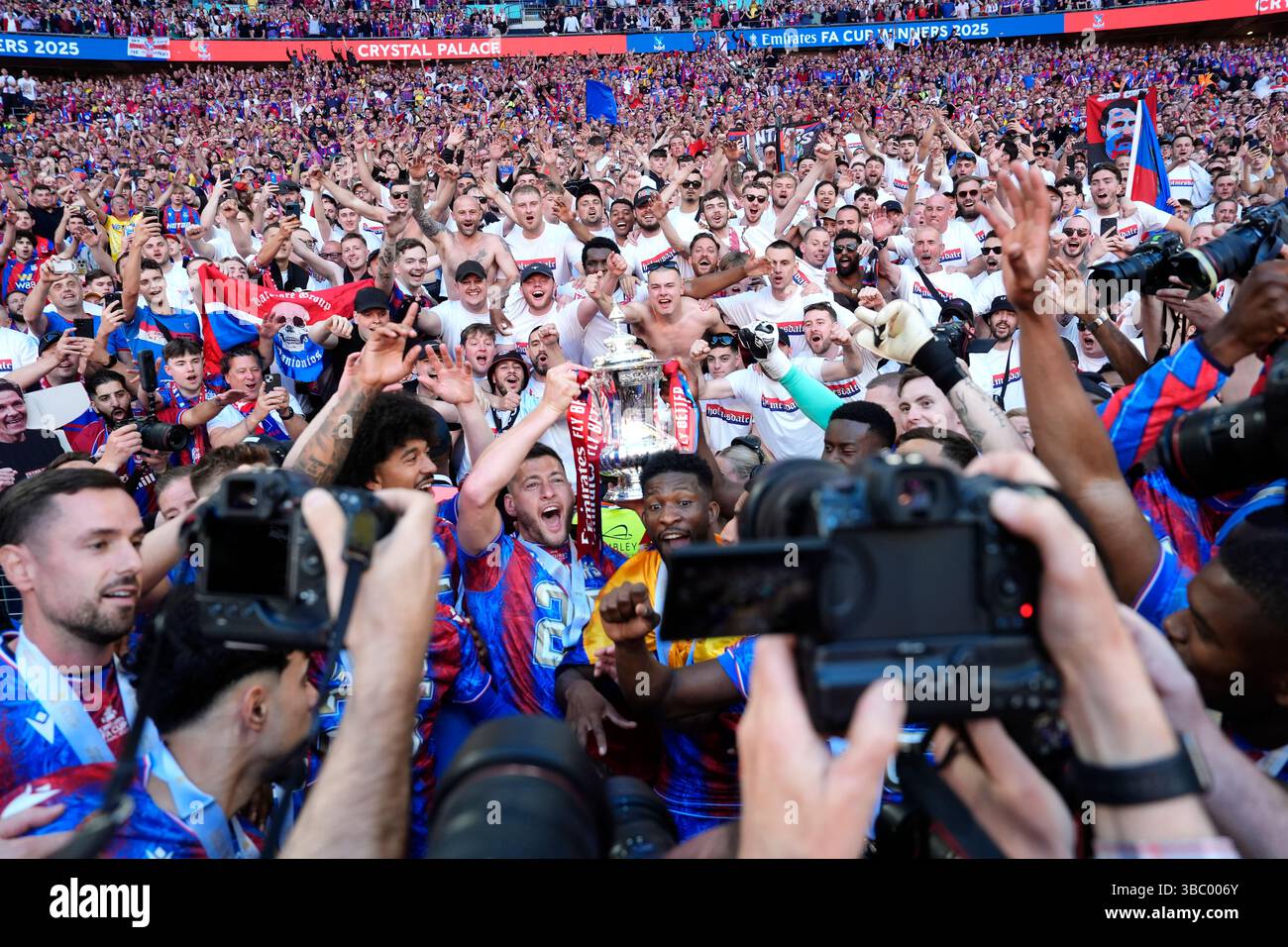 Crystal Palace's Joel Ward lifts the trophy following the Emirates FA ...
