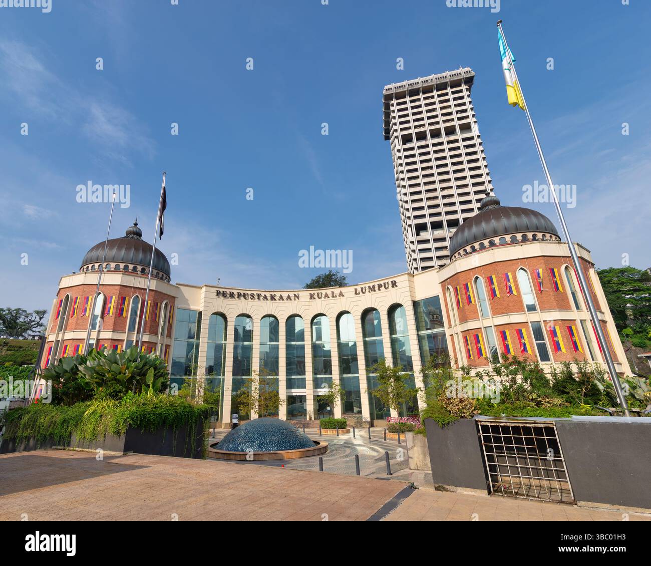 Exterior view of the Kuala Lumpur Library building with domes, glass ...