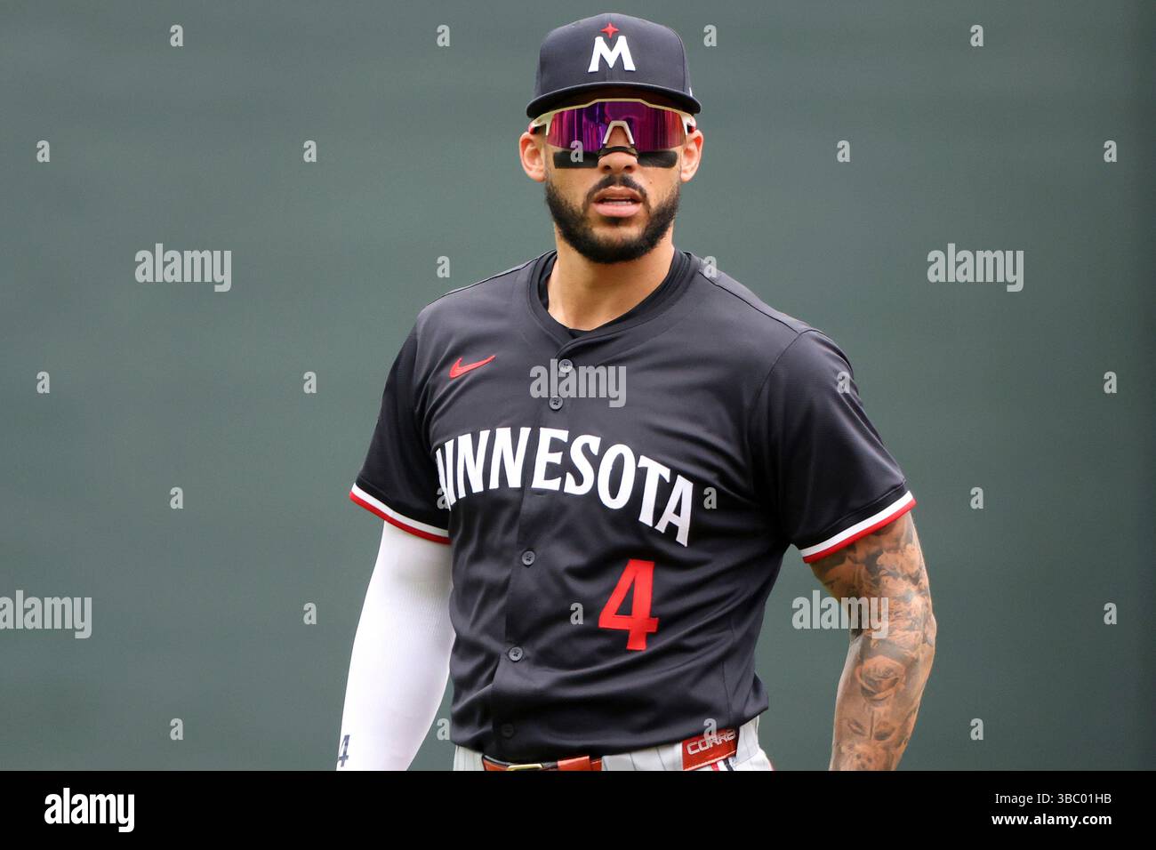 Minnesota Twins shortstop Carlos Correa looks on before a baseball game ...