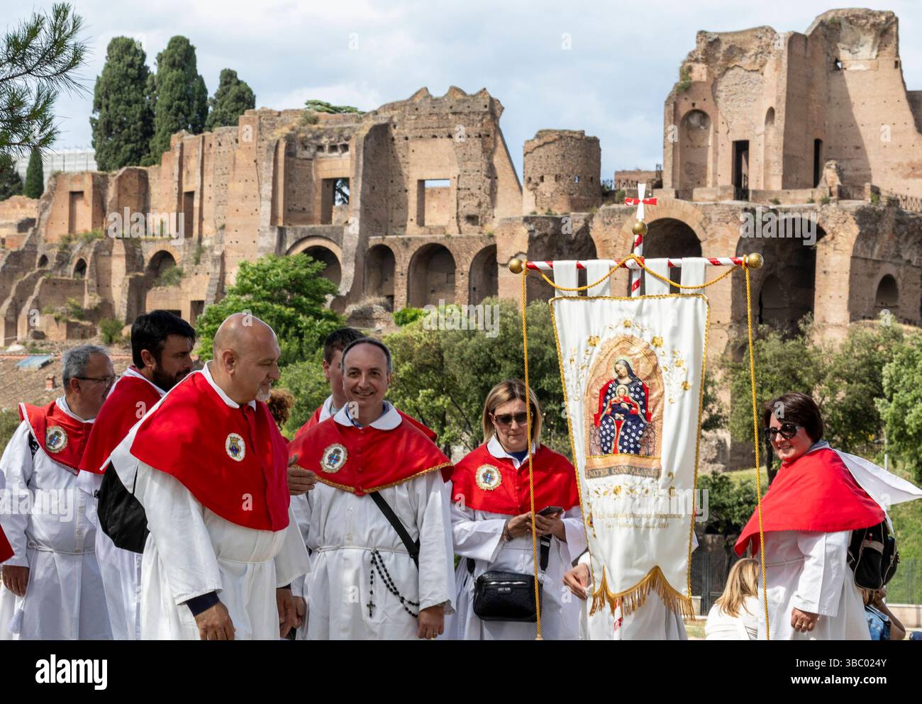 Vatican jubilee in Italy Members of a confraternity attend a procession ...