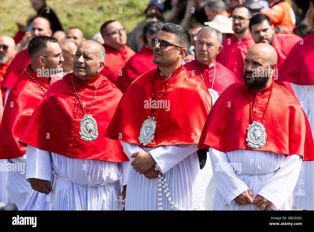 Vatican jubilee in Italy Members of a confraternity attend a procession ...