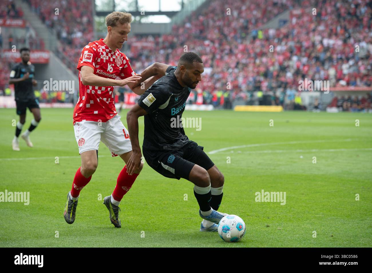 Mainz, Deutschland. 17th May, 2025. Jonathan TAH (LEV) versus Nikolas VERATSCHNIG (MZ) action ...