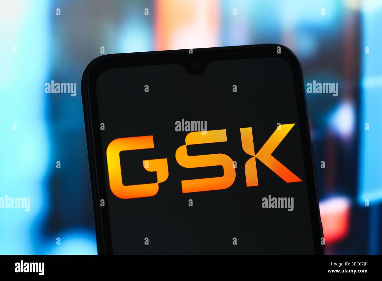 In this photo illustration, the GSK logo is seen displayed on a ...