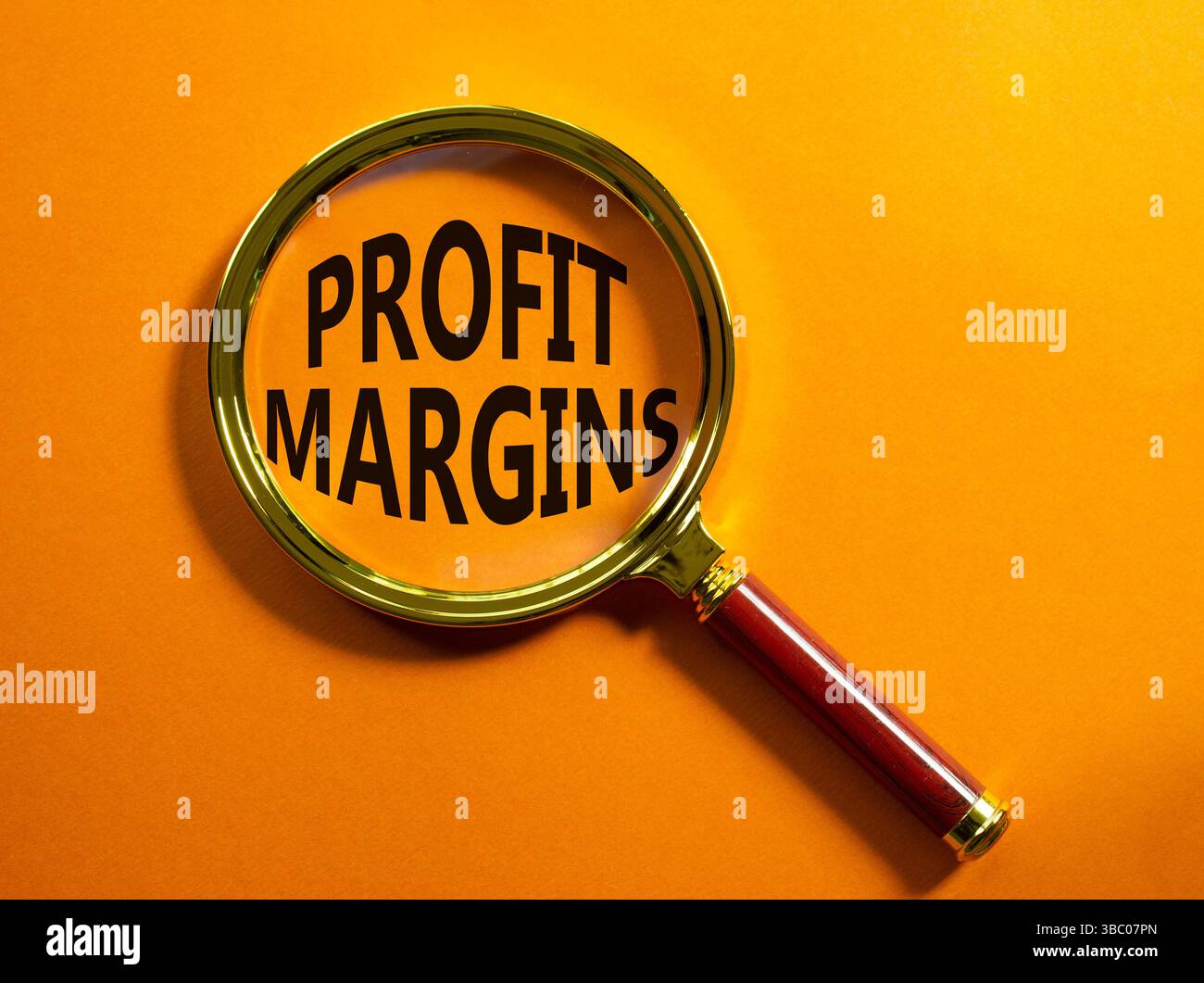 Profit Margins symbol. Magnifying glass with words Profit Margins ...