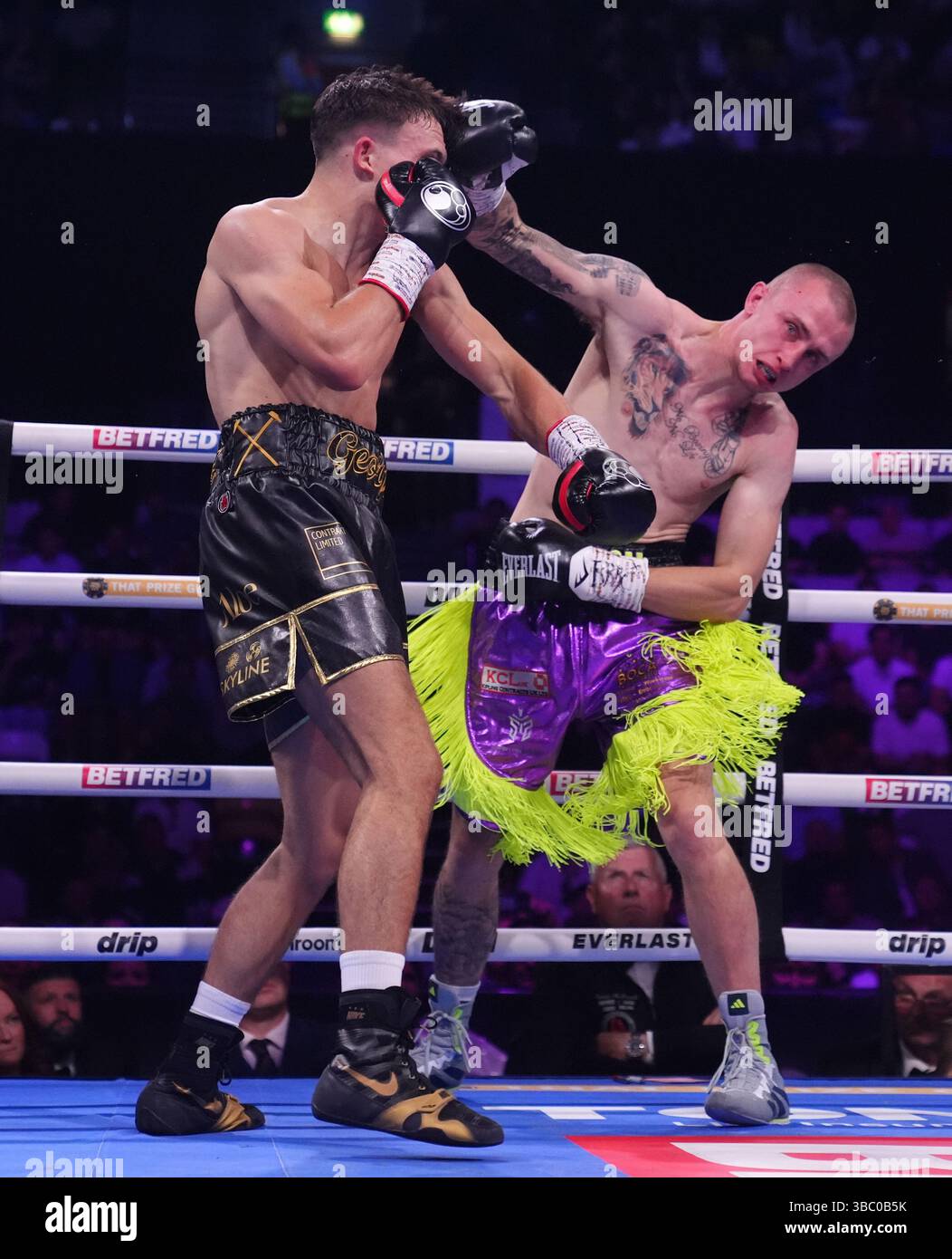 George Liddard and Aaron Sutton during their Middleweight bout at the ...