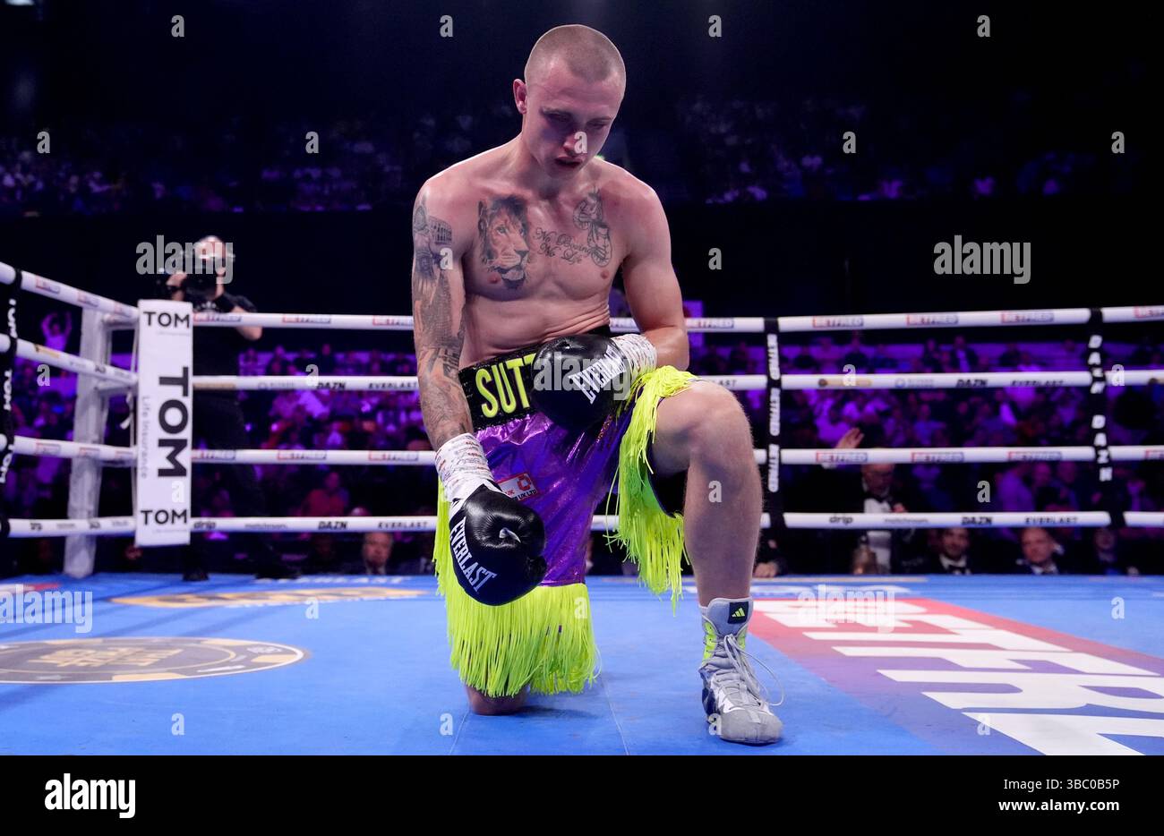 Aaron Sutton is knocked down by George Liddard before his team throw in the towel during their ...