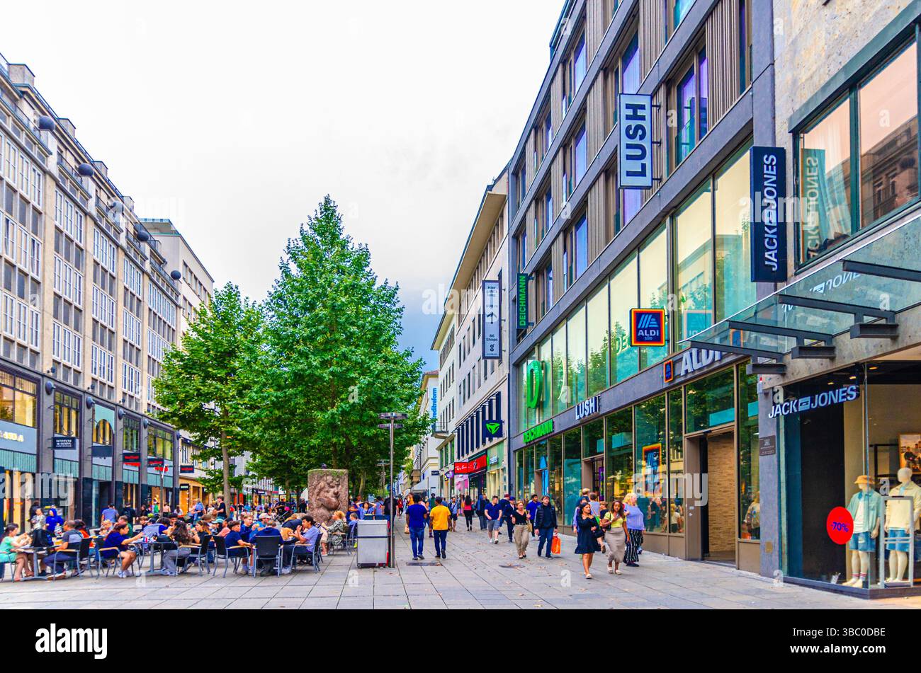 Stuttgart, Germany, July 12, 2024: crowd of people tourists walking ...