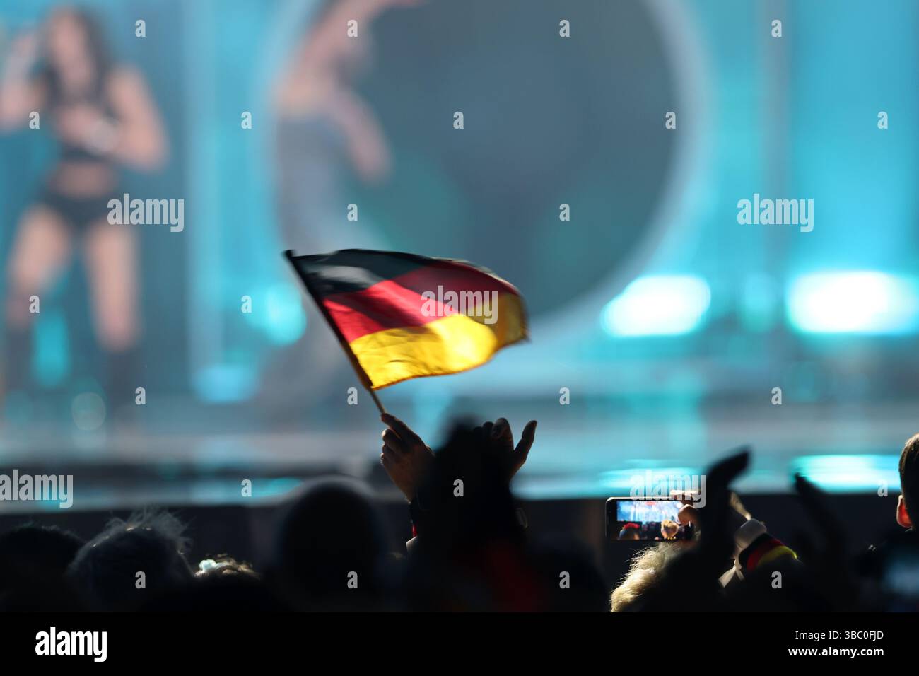 Basel, Switzerland. 17th May, 2025. Fans wave a German flag during the ...