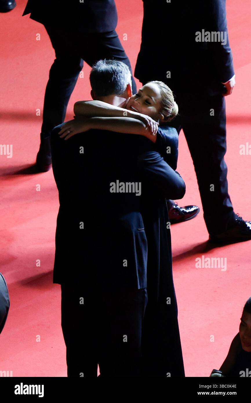 Jennifer Lawrence, right, embraces Cooke Maroney upon departure from ...