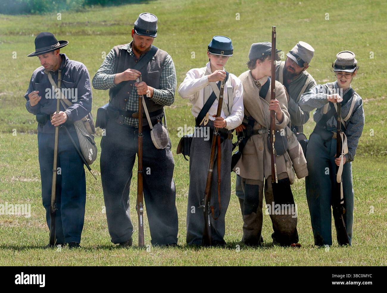 Historical reenactors portraying soldiers in the Confederate Army ...