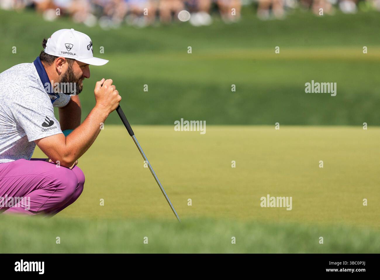 Captain Jon Rahm of Legion XIII reads his putt on the 16th green during ...
