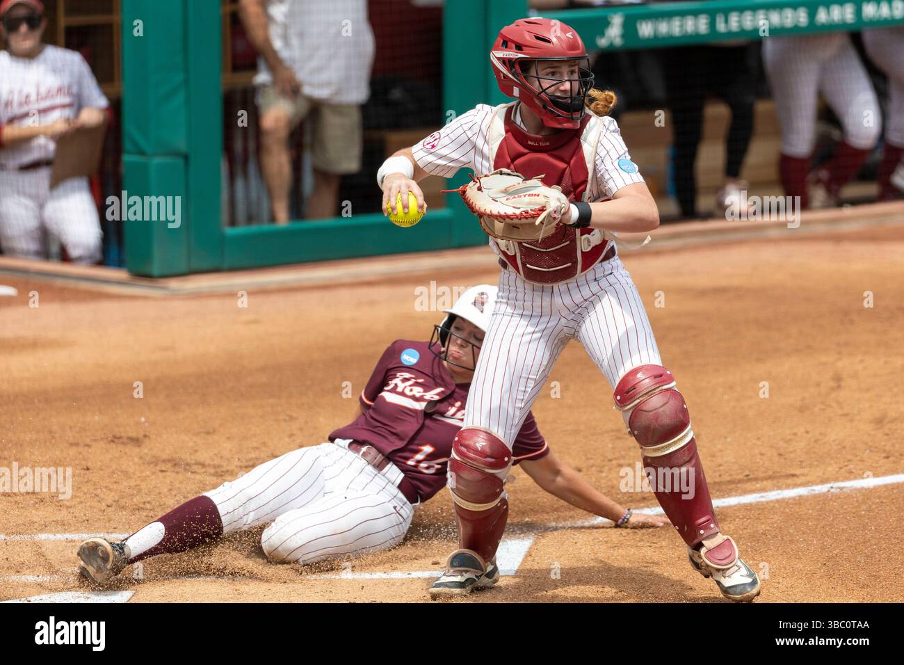 Alabama catcher Marlie Giles (34) gets a force out on Virginia Tech ...