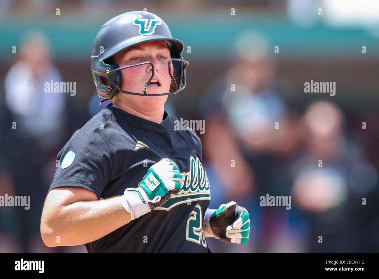 South Florida catcher Josie Foreman (28) runs to first during an NCAA ...