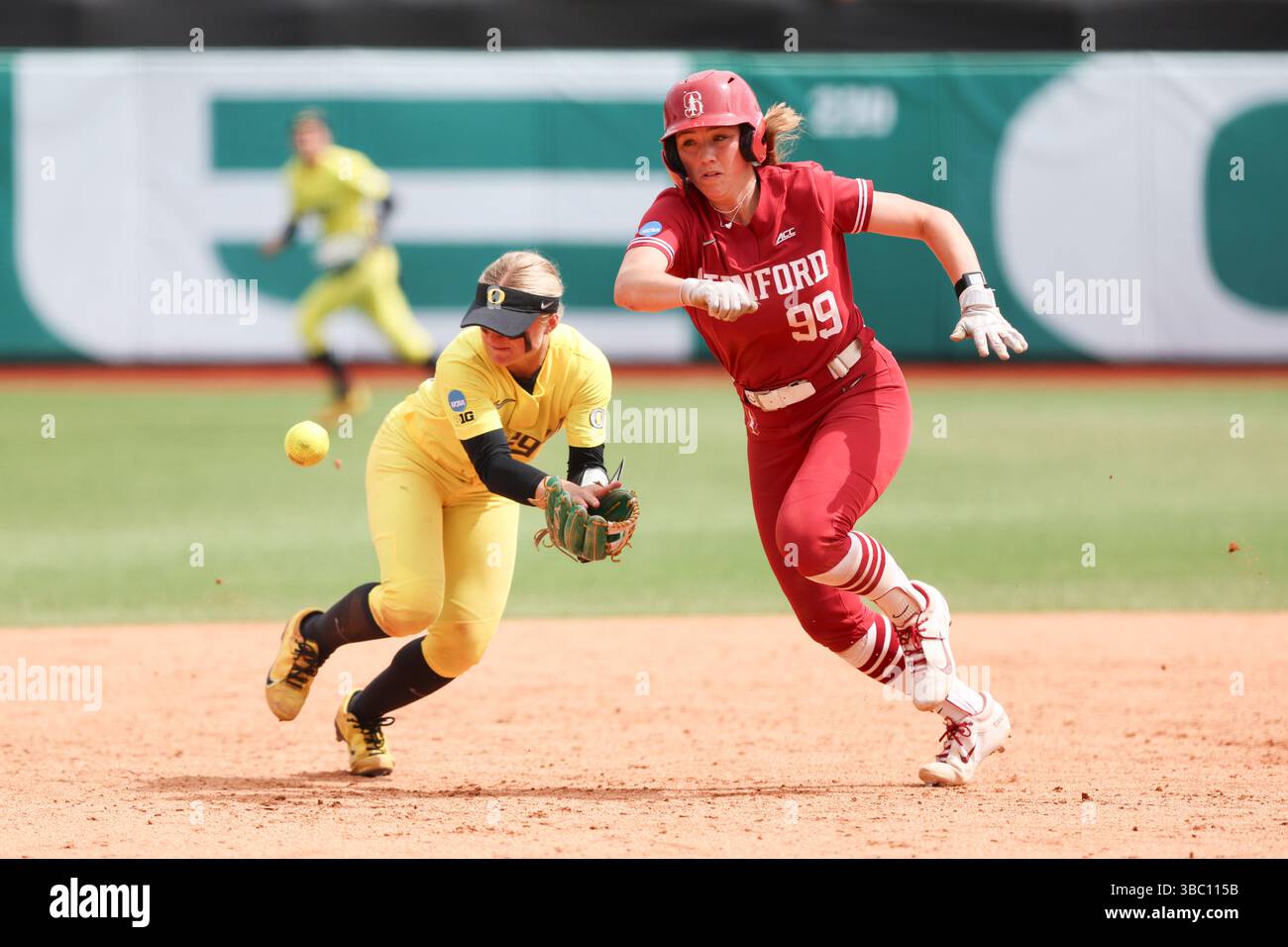 Stanford infielder Taryn Kern (99) runs past Oregon infielder Paige ...